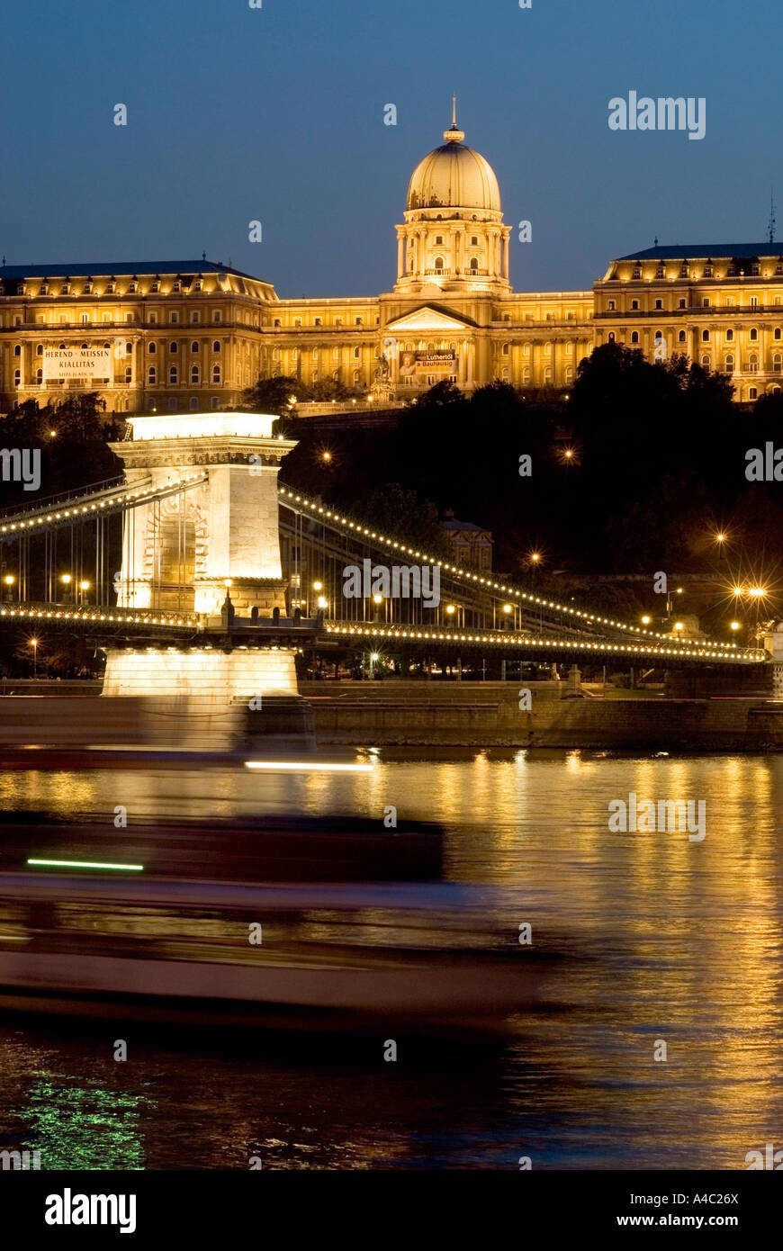Chain Bridge Buda Castle and Ship at dusk Budapest Hungary Stock Photo ...