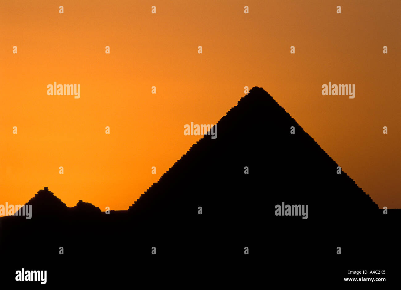 Silhouettes of the Great pyramids of Giza after sunset Egypt Stock ...