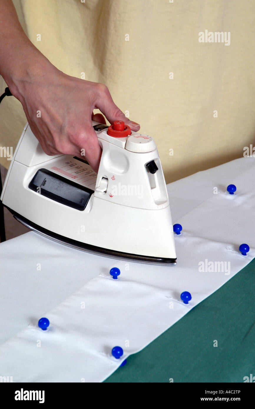 Women doing some ironing Stock Photo - Alamy