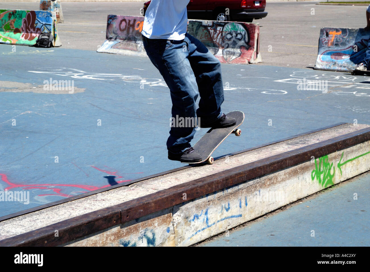 Skateboarder riding the rail Stock Photo - Alamy