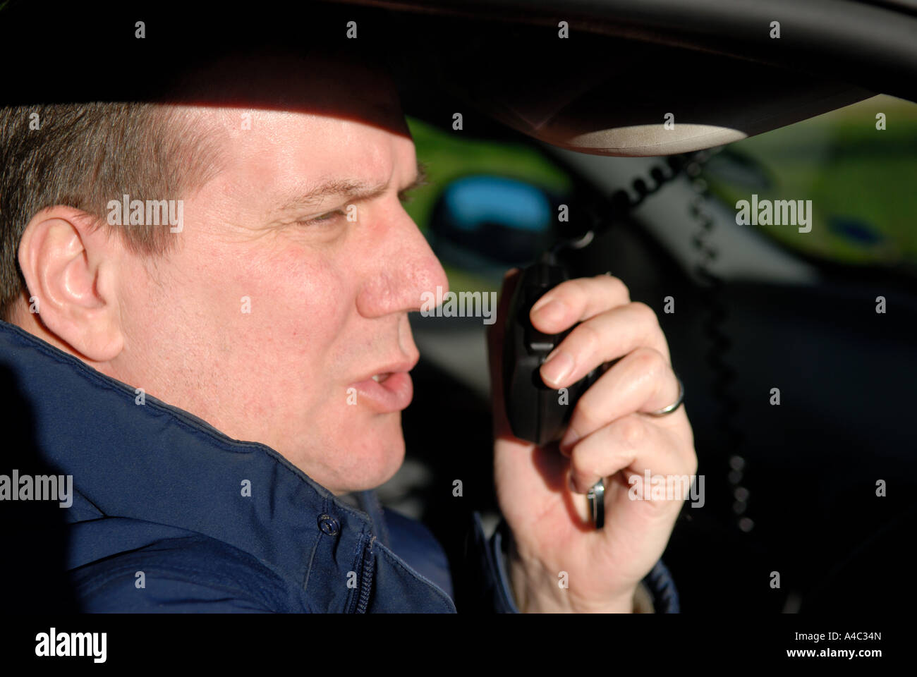 Male on Two way Radio Stock Photo - Alamy