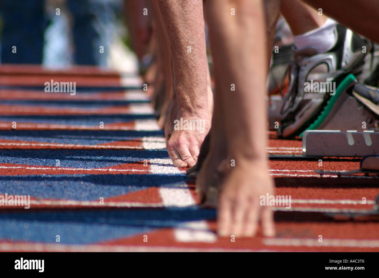 Athletes at Starting Line Stock Photo - Alamy