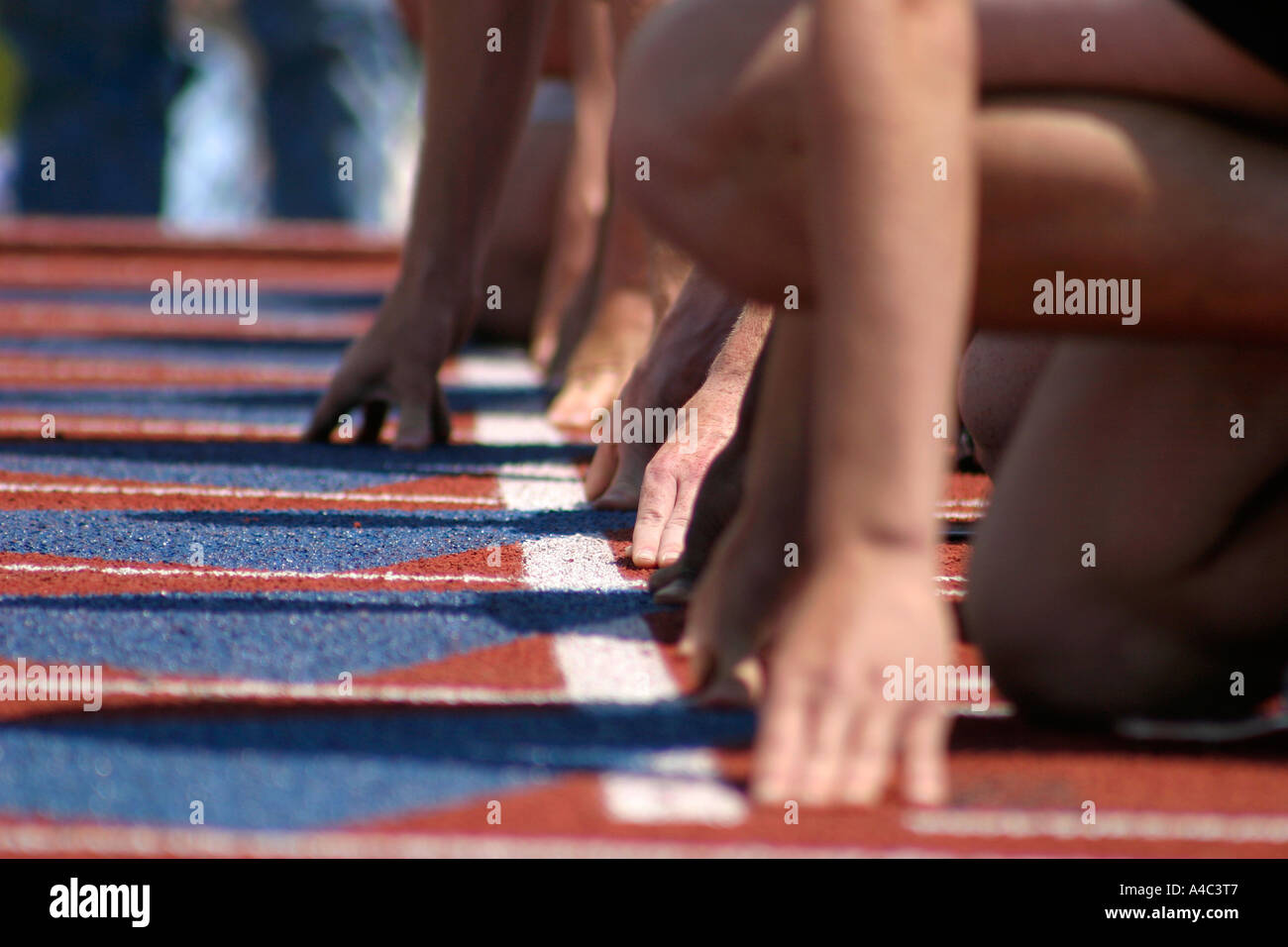 Athletes at Starting Line Stock Photo - Alamy