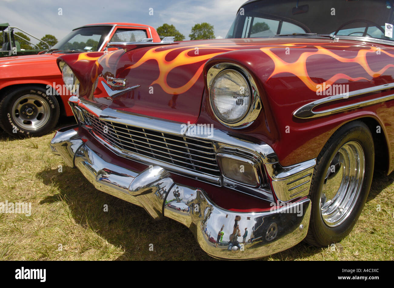 Chevrolet with wild red yellow and orange paint job Stock Photo - Alamy