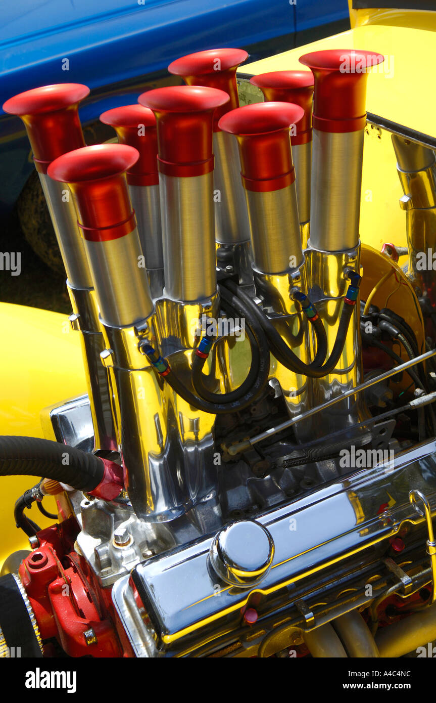 Engine intake carburater manifolds on hot rod Stock Photo - Alamy