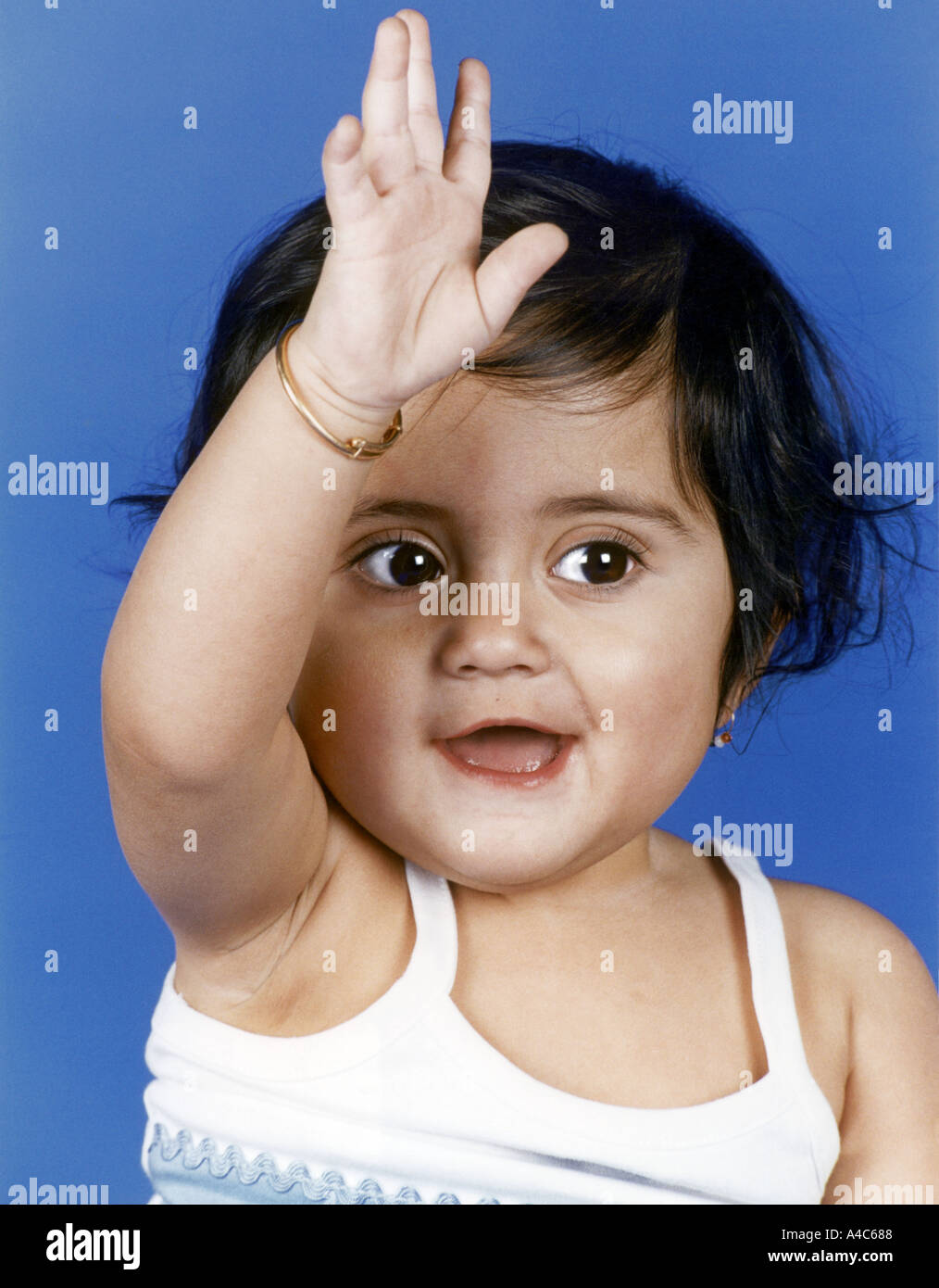 India young child with hand raised hi-res stock photography and images ...