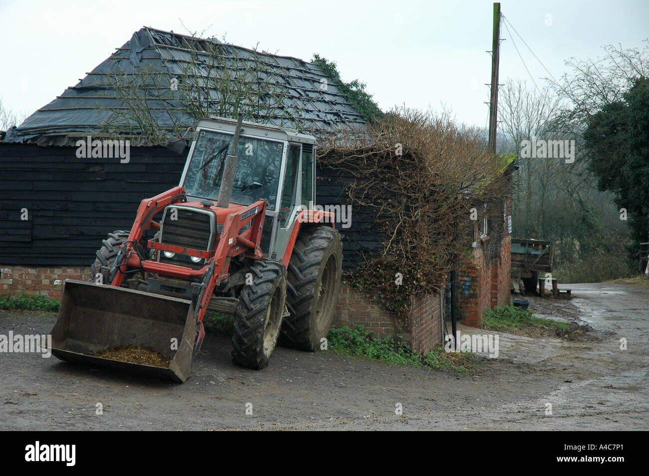 Tractor on a Farm Stock Photo - Alamy