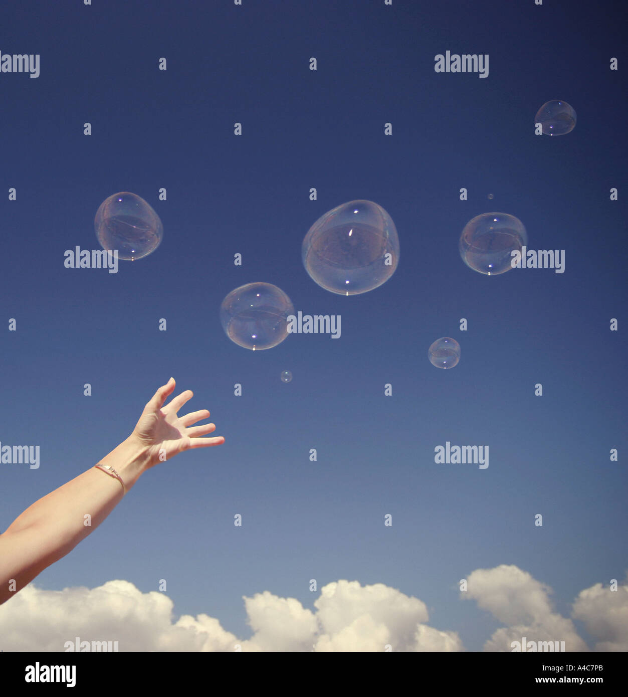 Hand touch bubbles hi-res stock photography and images - Alamy