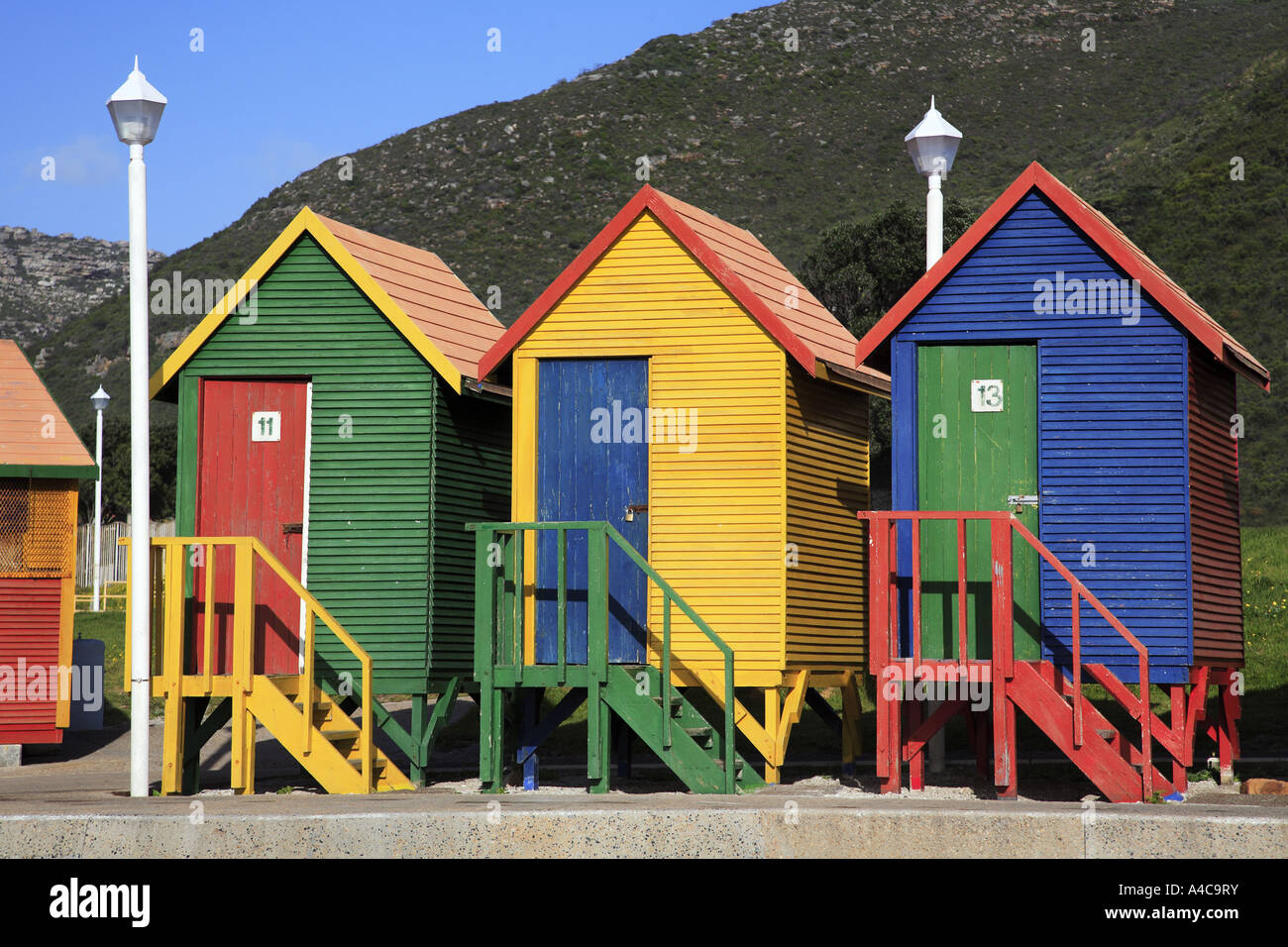 three beach huts in Muizenberg Stock Photo - Alamy