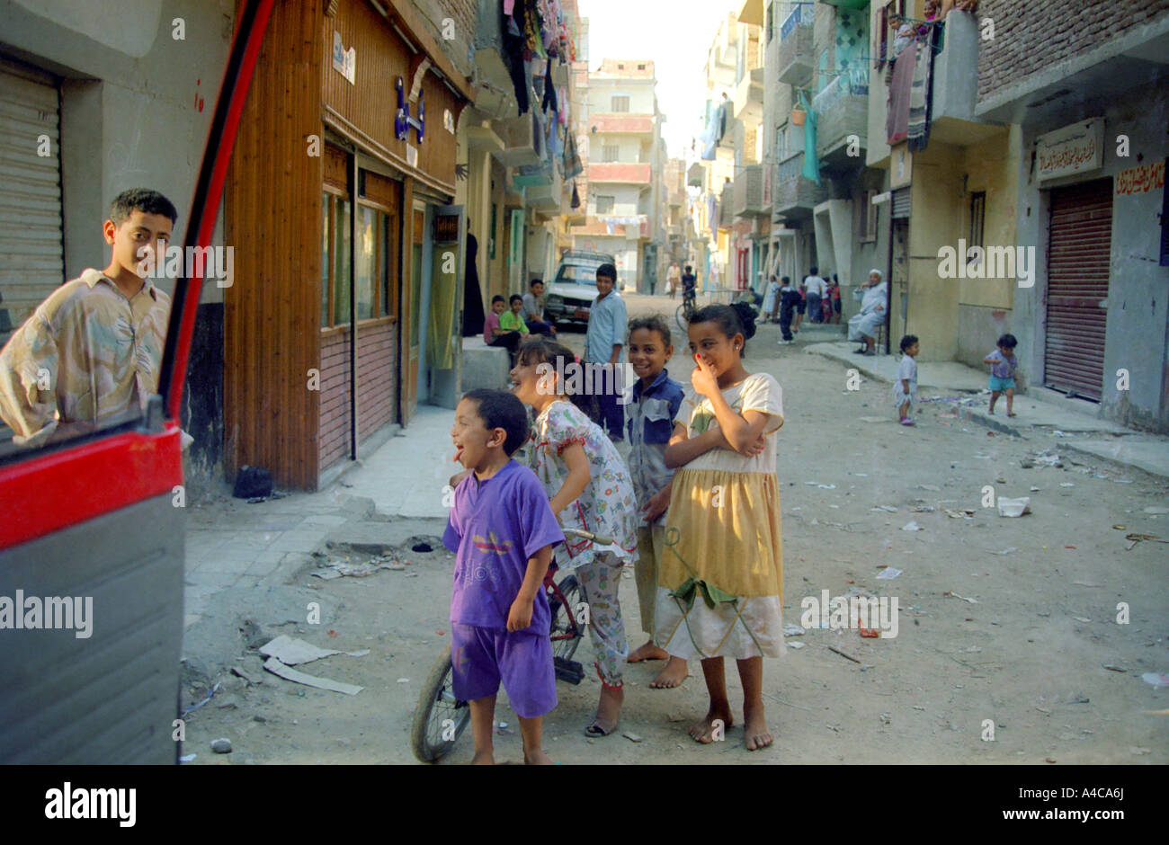 Local children playing in the street in Suez, Egypt Stock Photo - Alamy