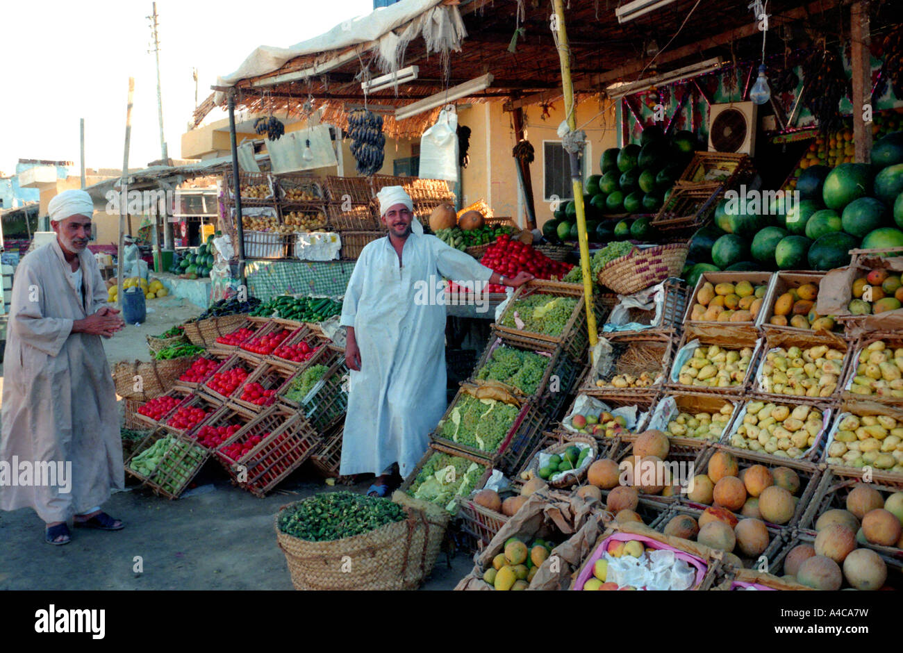 Local men at food stall in Siwa Oasis, Egypt Stock Photo - Alamy