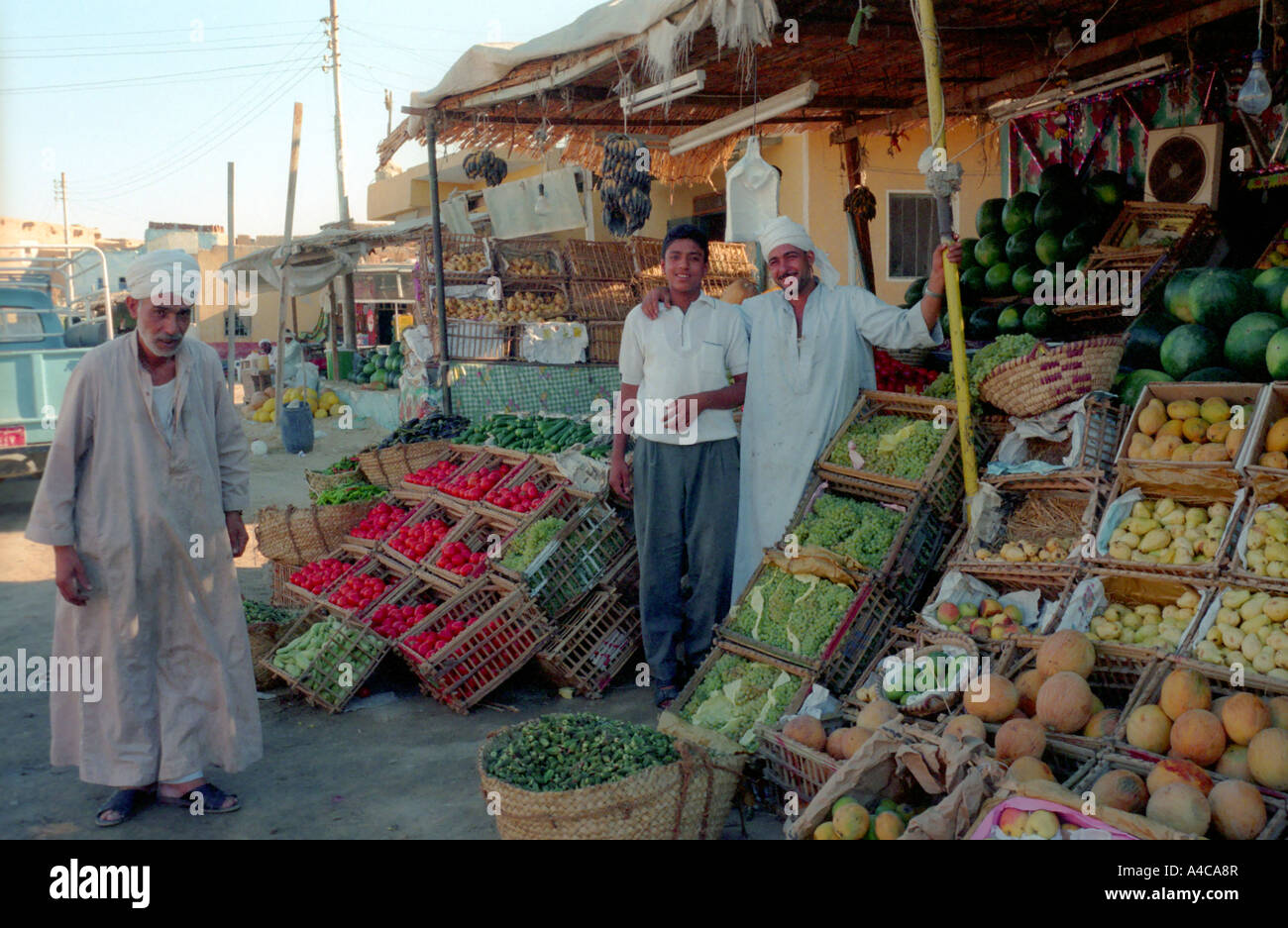 Local men at food stall in Siwa Oasis, Egypt Stock Photo - Alamy