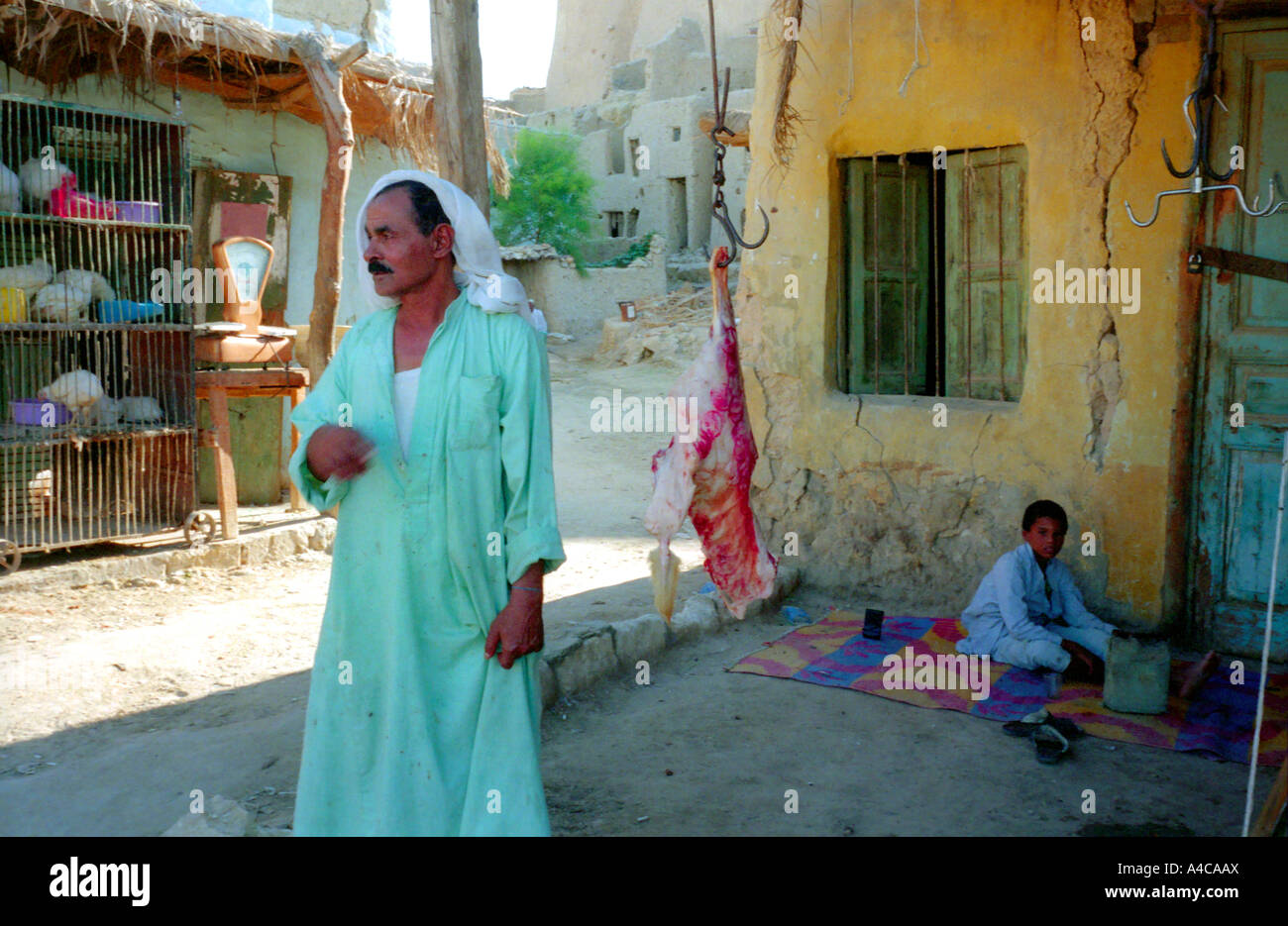 Local men at food stall in Siwa Oasis, Egypt Stock Photo - Alamy