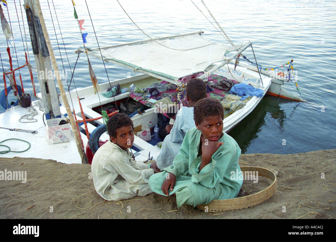 Local children at the bank of the river Nile in Aswan, Egypt Stock ...