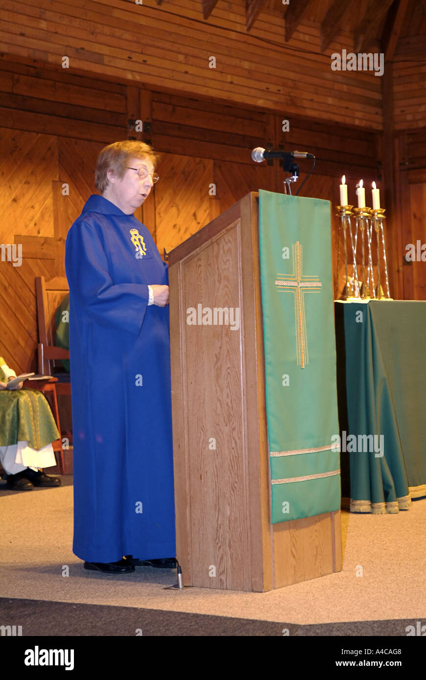 A choir member is singing the psalm during the mass Shrine of Our Lady ...