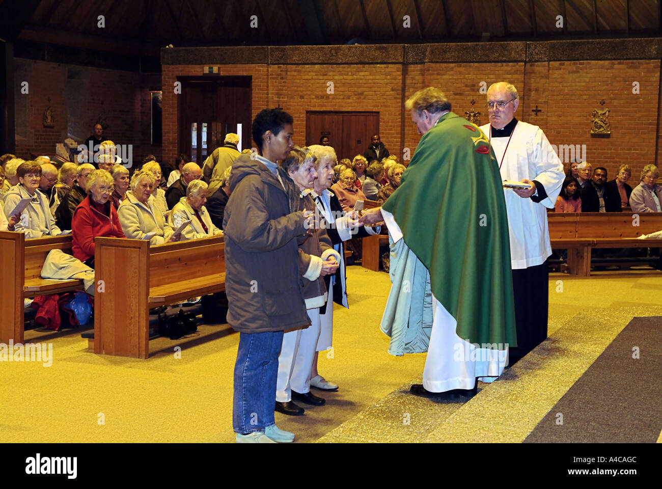 Bring in of the offerings during the mass at the Shrine of Our Lady of ...