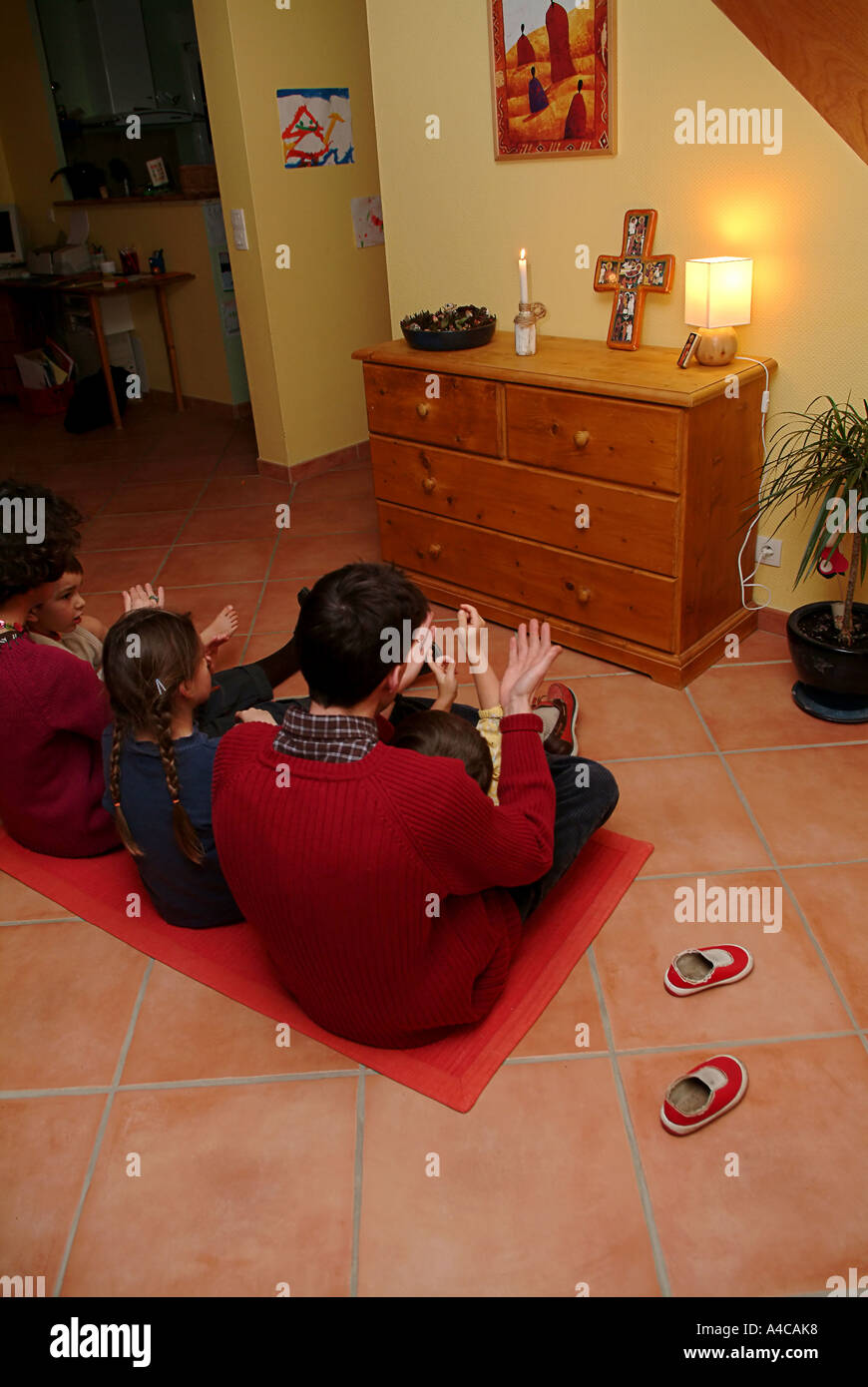 Family praying together on hi-res stock photography and images - Alamy