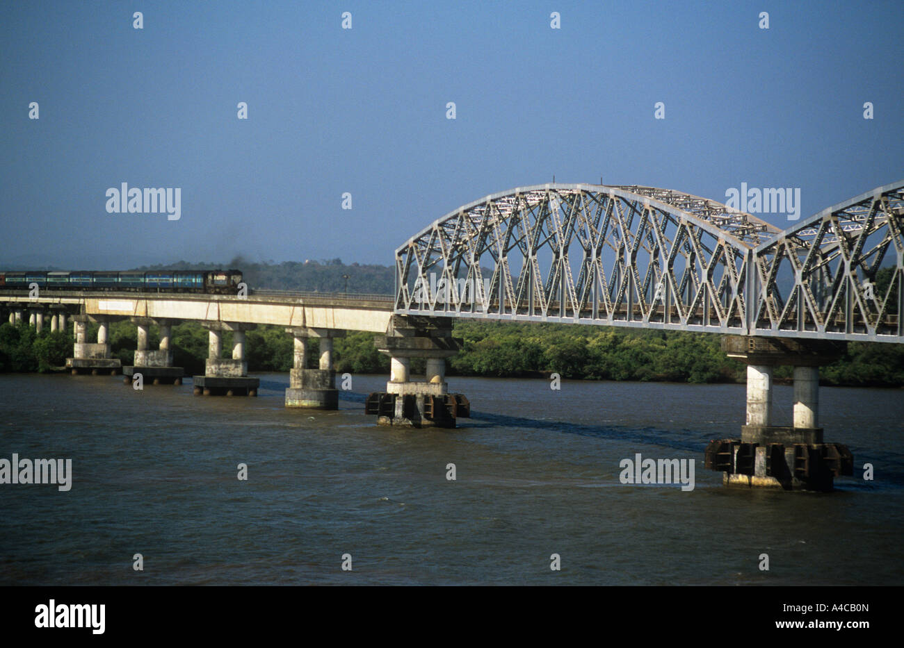 Konkan Railway train. Bridge over Zuari River Goa India Stock Photo - Alamy