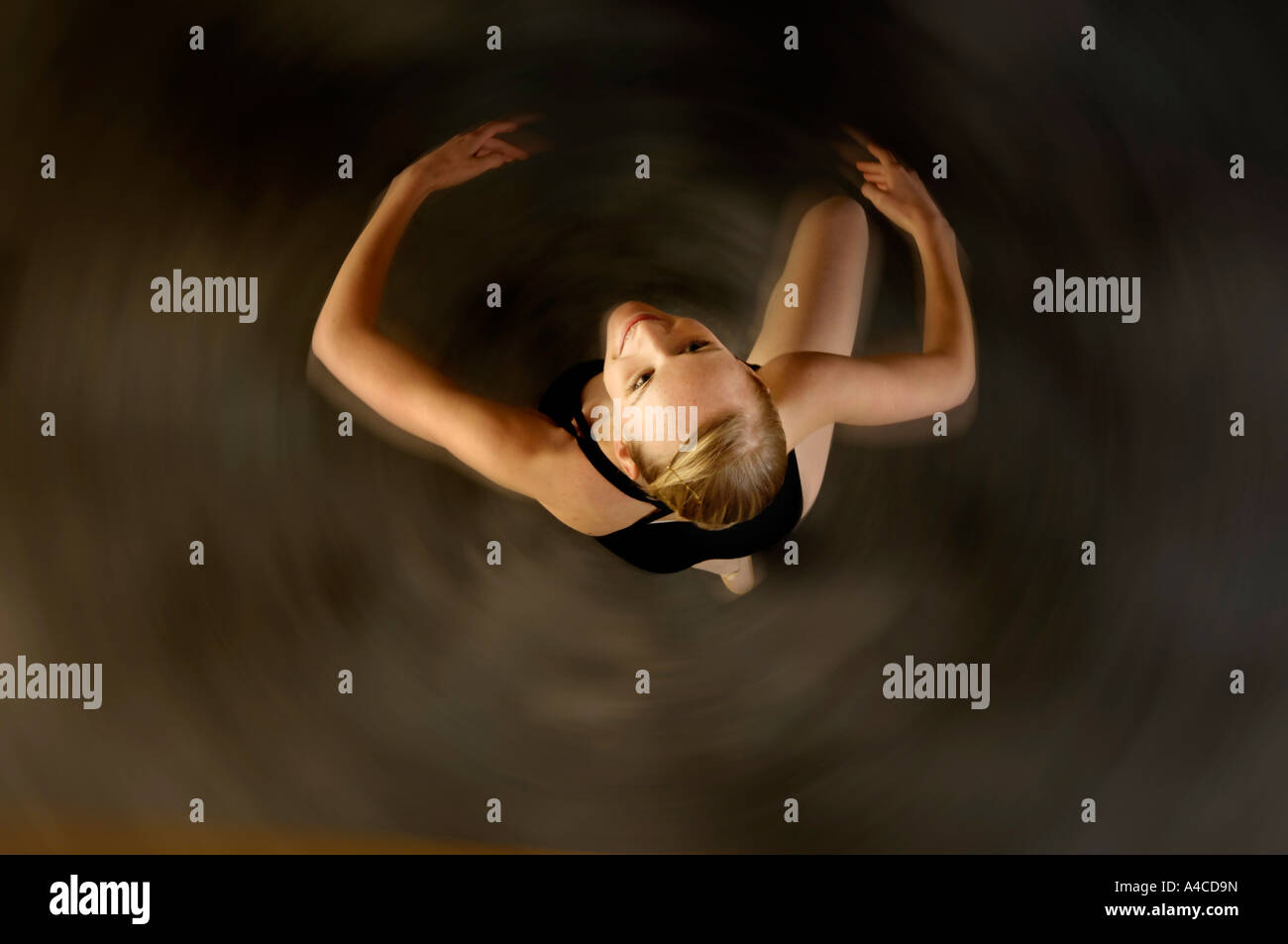 a young female ballerina twirling view from above Stock Photo - Alamy