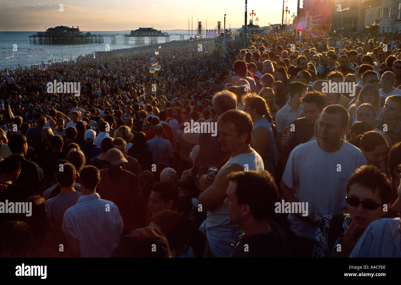 Crowd of people in Brighton beach gathering for a concert Stock Photo ...