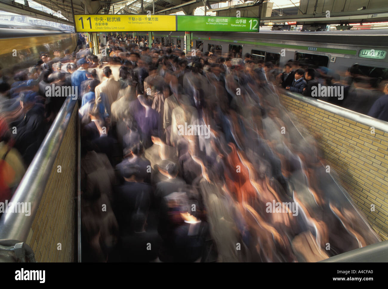 Commuter traffic in city subway station in Tokyo Stock Photo - Alamy