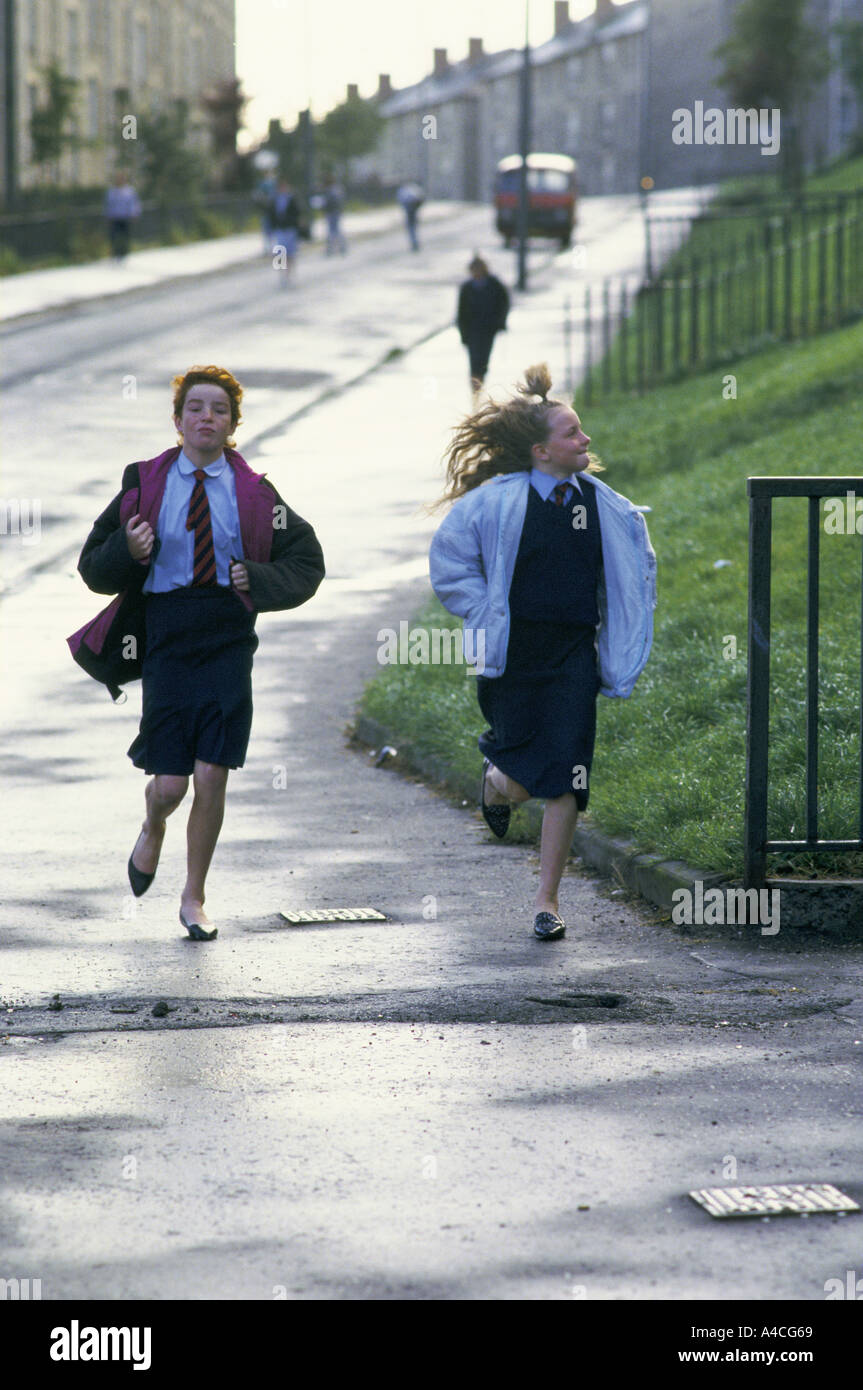 Schoolchildren running home Stock Photo - Alamy