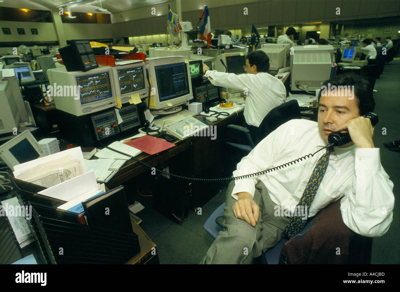 trading floor london 1994 a broker on telephone sitting lazily Stock ...
