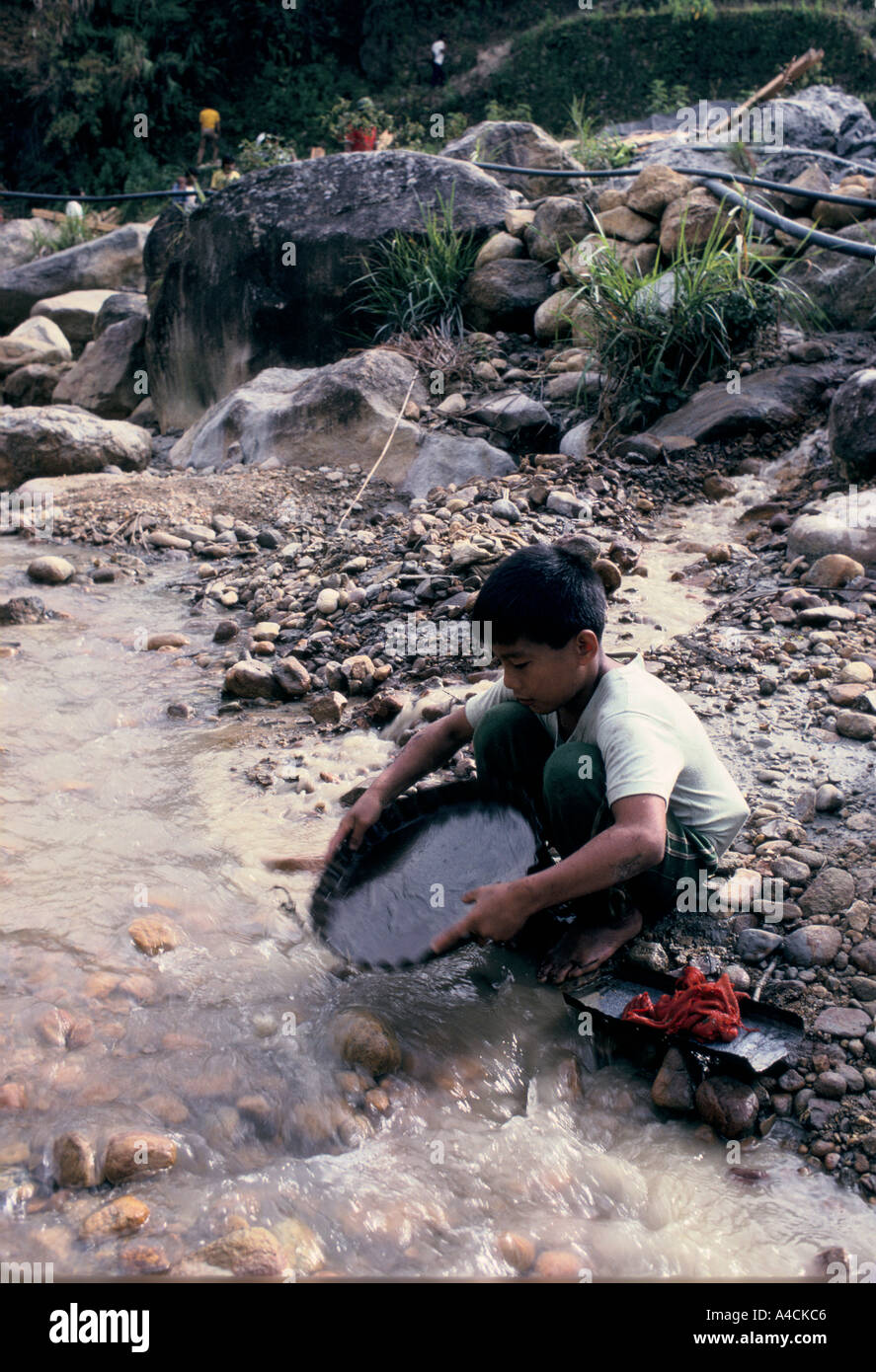 children panning for gold mainit mount prov philipines 1991 Stock Photo ...