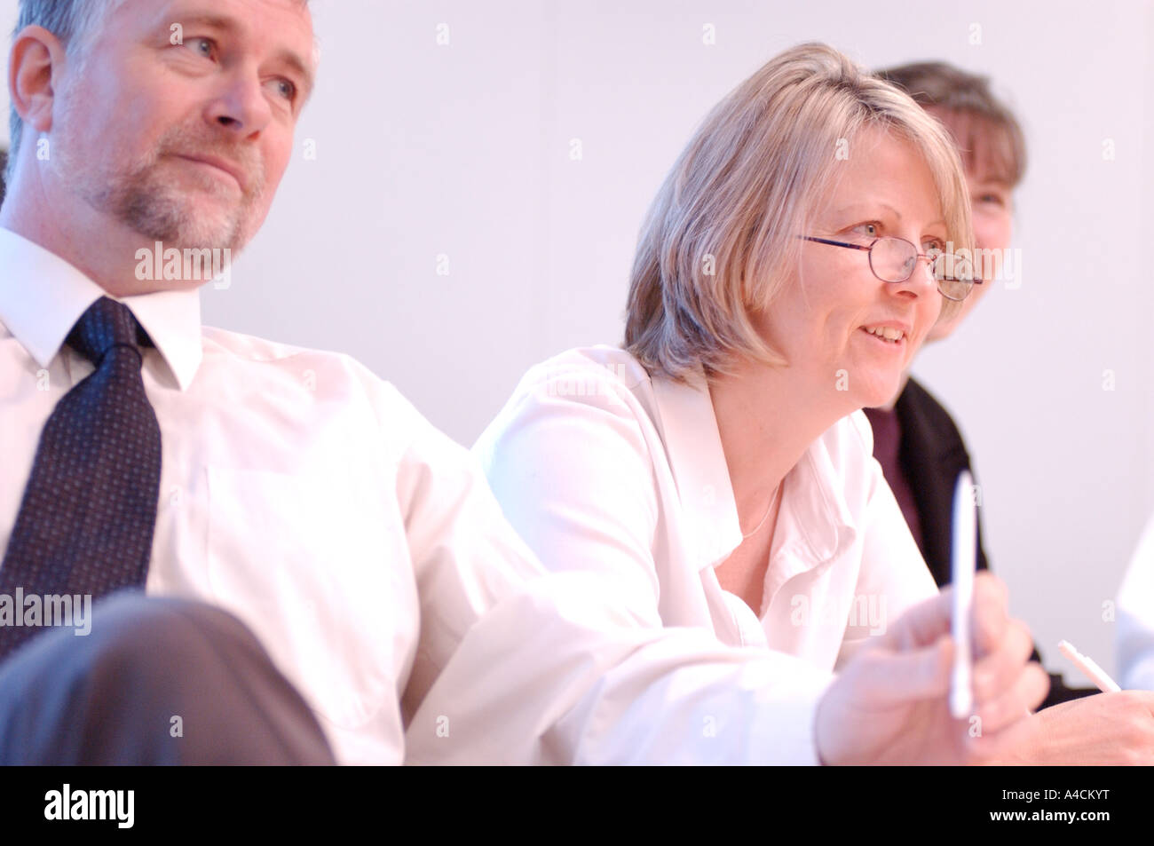 Happy office workers uk hi-res stock photography and images - Alamy