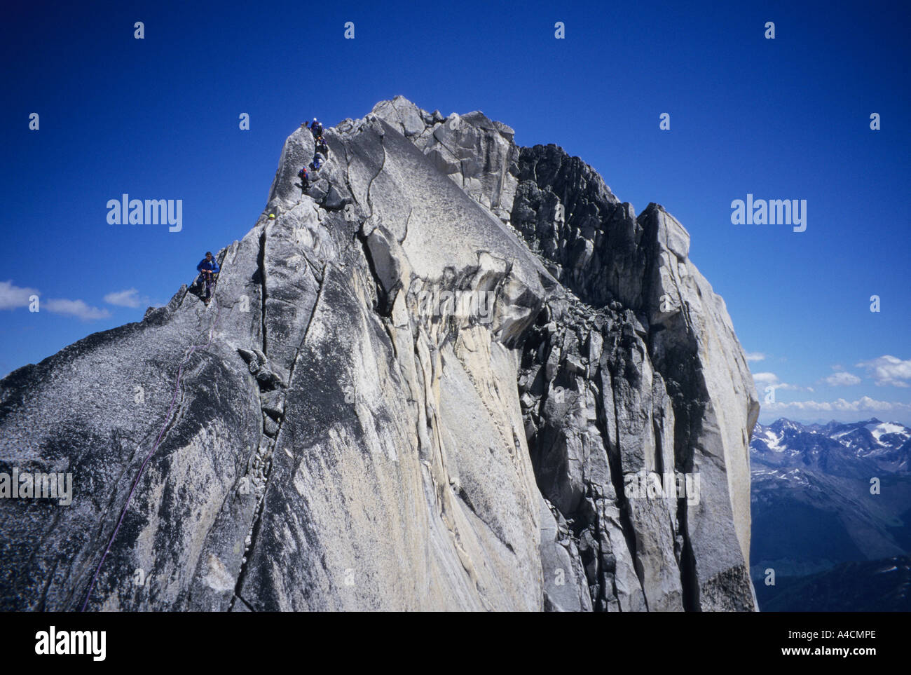 Climbers on Pigeon Spire Bugaboo Provincial Park BC Canada Stock Photo ...