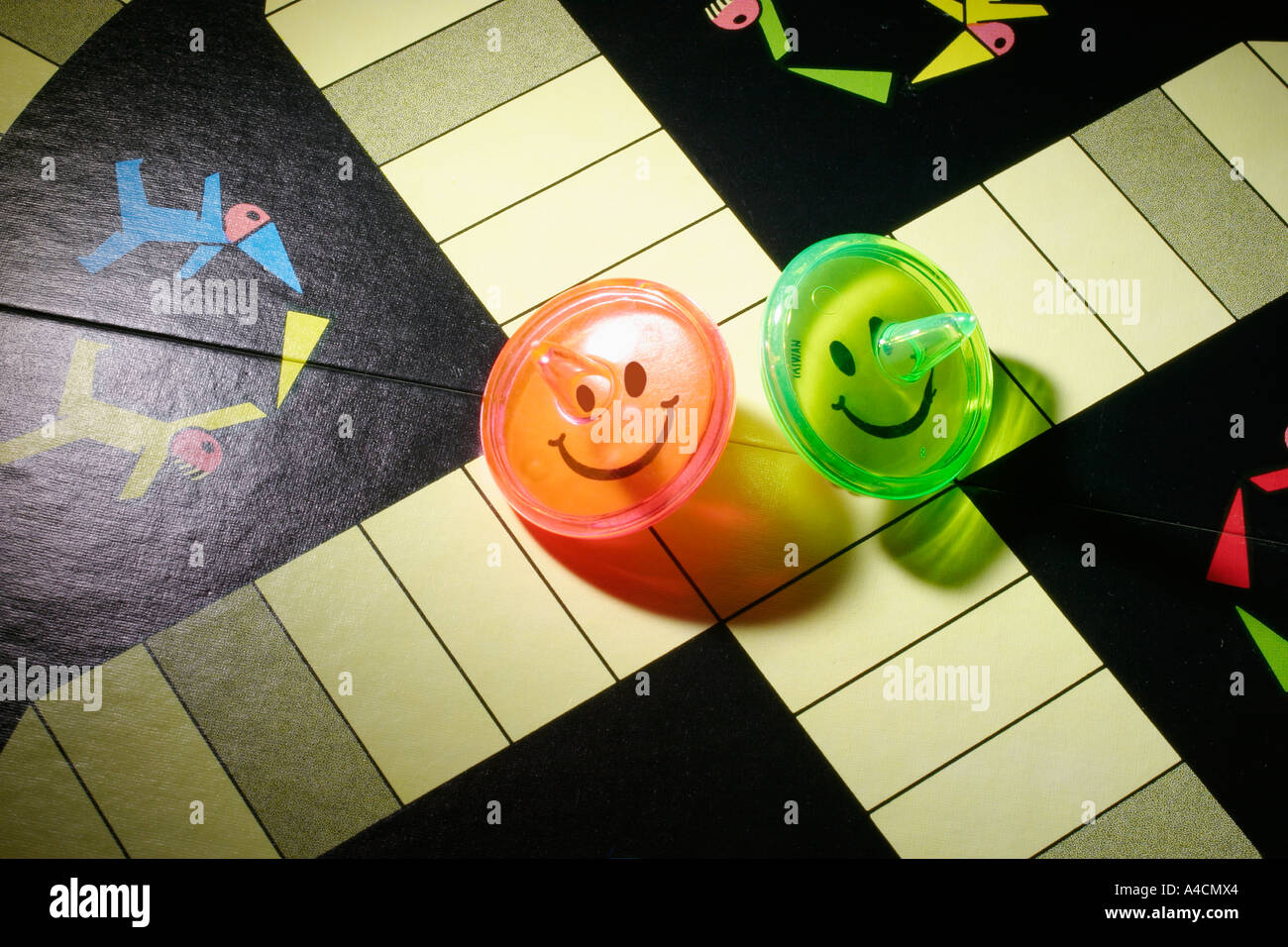 Tops on Game Board Stock Photo - Alamy