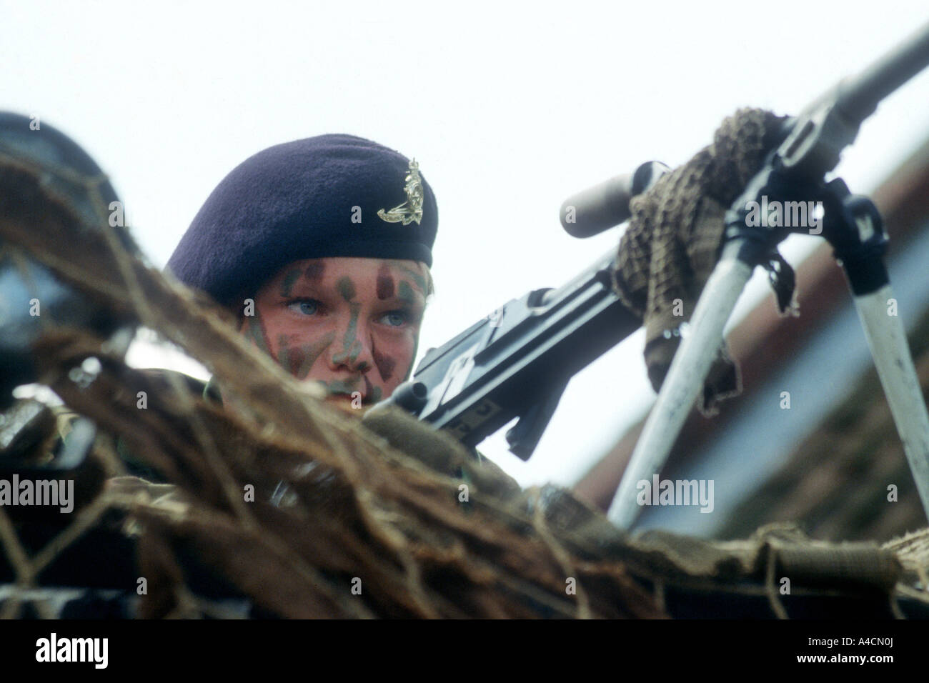 British army cadet mans machine gun during demo at Martham carnival ...