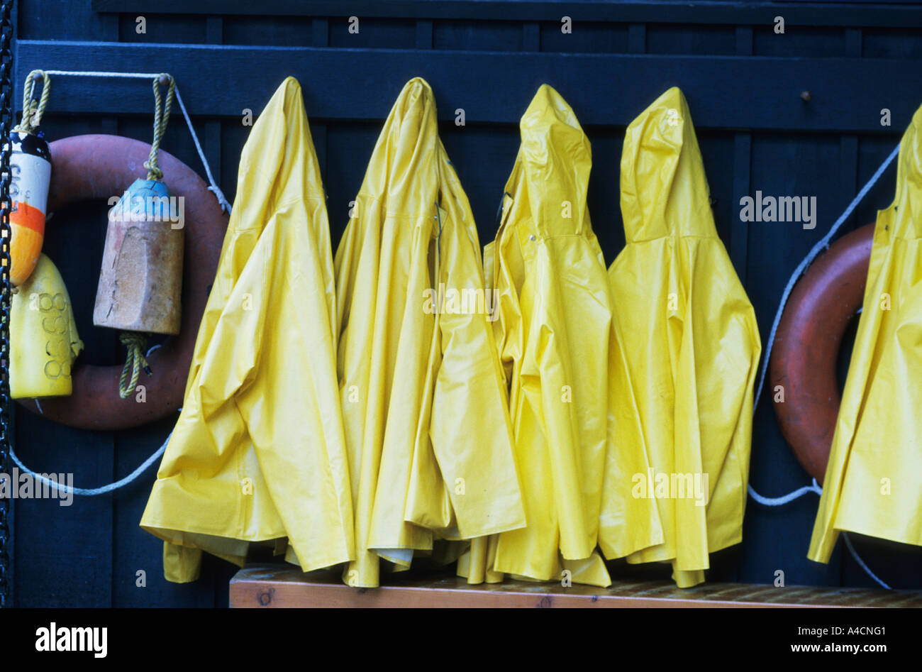 Rain coats raincoats hi-res stock photography and images - Alamy
