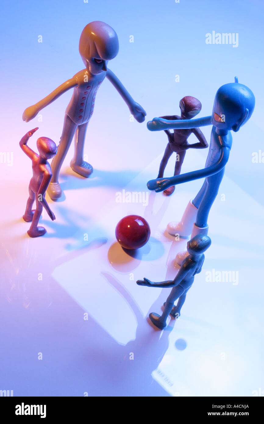 Toy Aliens Playing Ball Stock Photo - Alamy