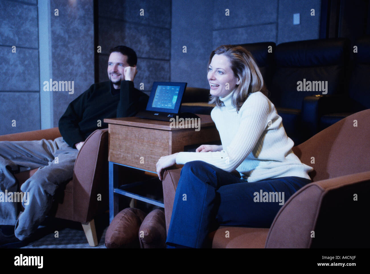 Men at home watching dvd hi-res stock photography and images - Alamy