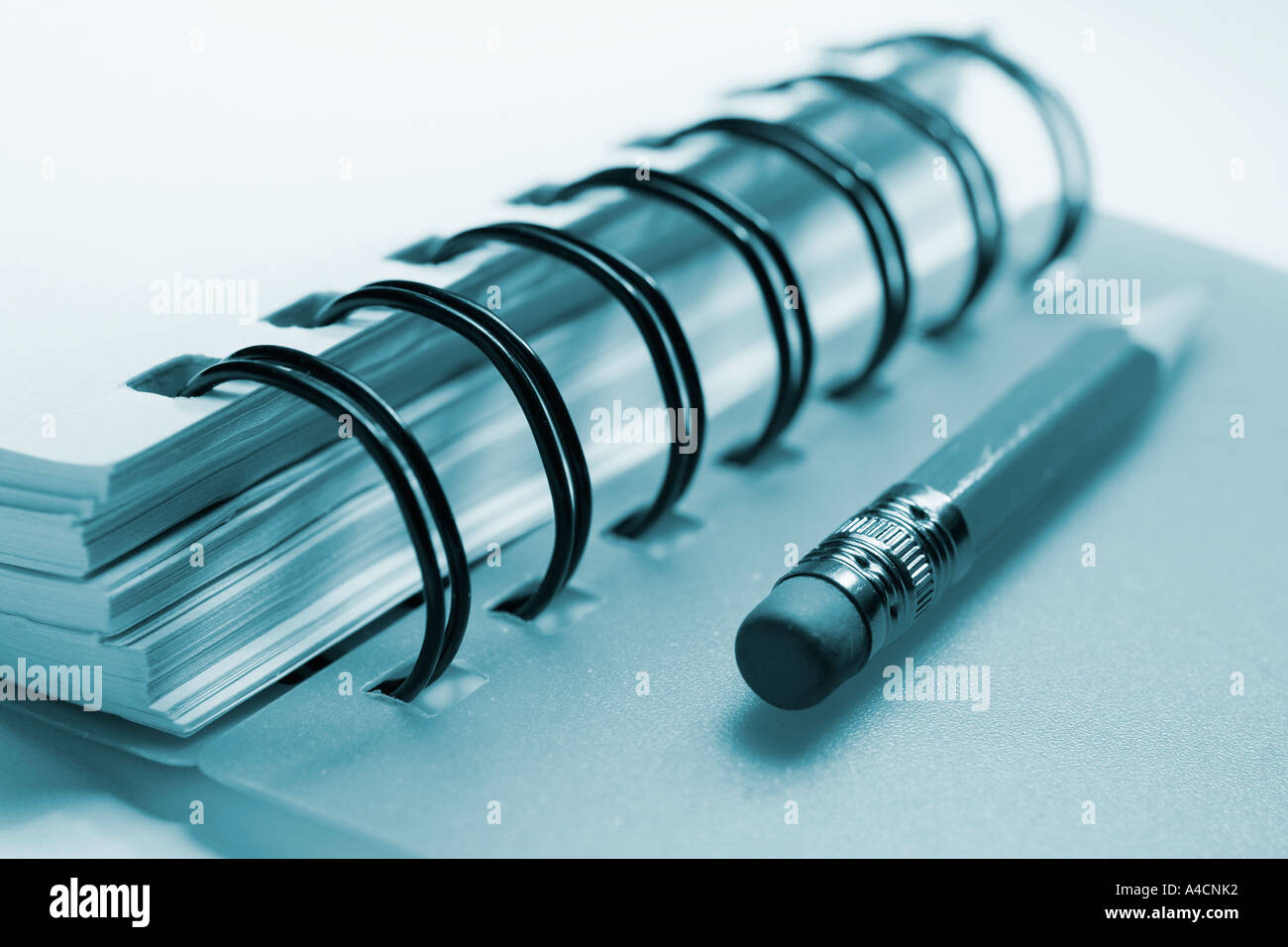 Short Pencil and Note Book Stock Photo - Alamy