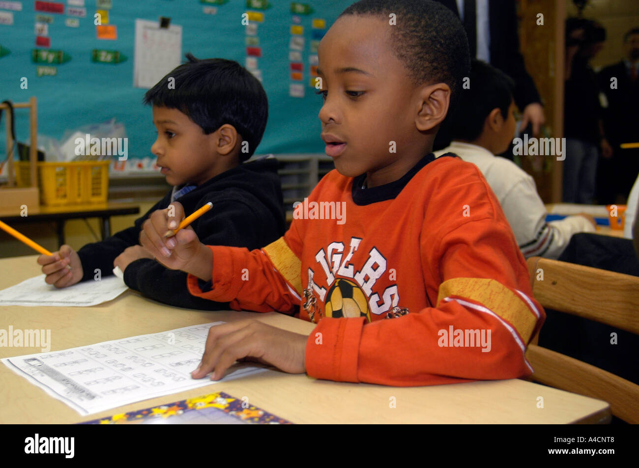 First grade kids classroom hi-res stock photography and images - Alamy