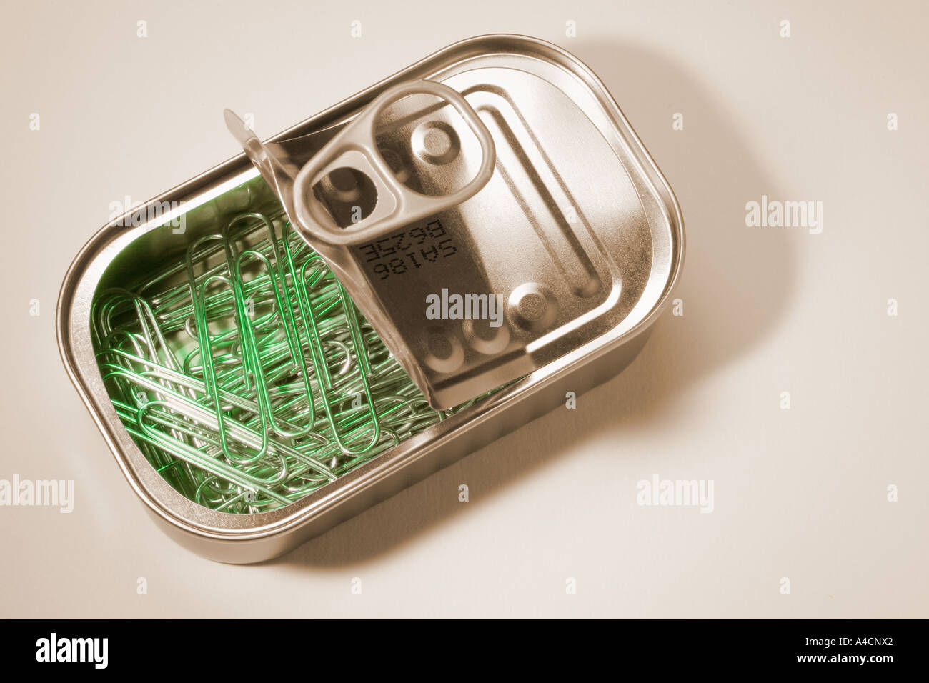 Paper Clips in Tin Can Stock Photo - Alamy