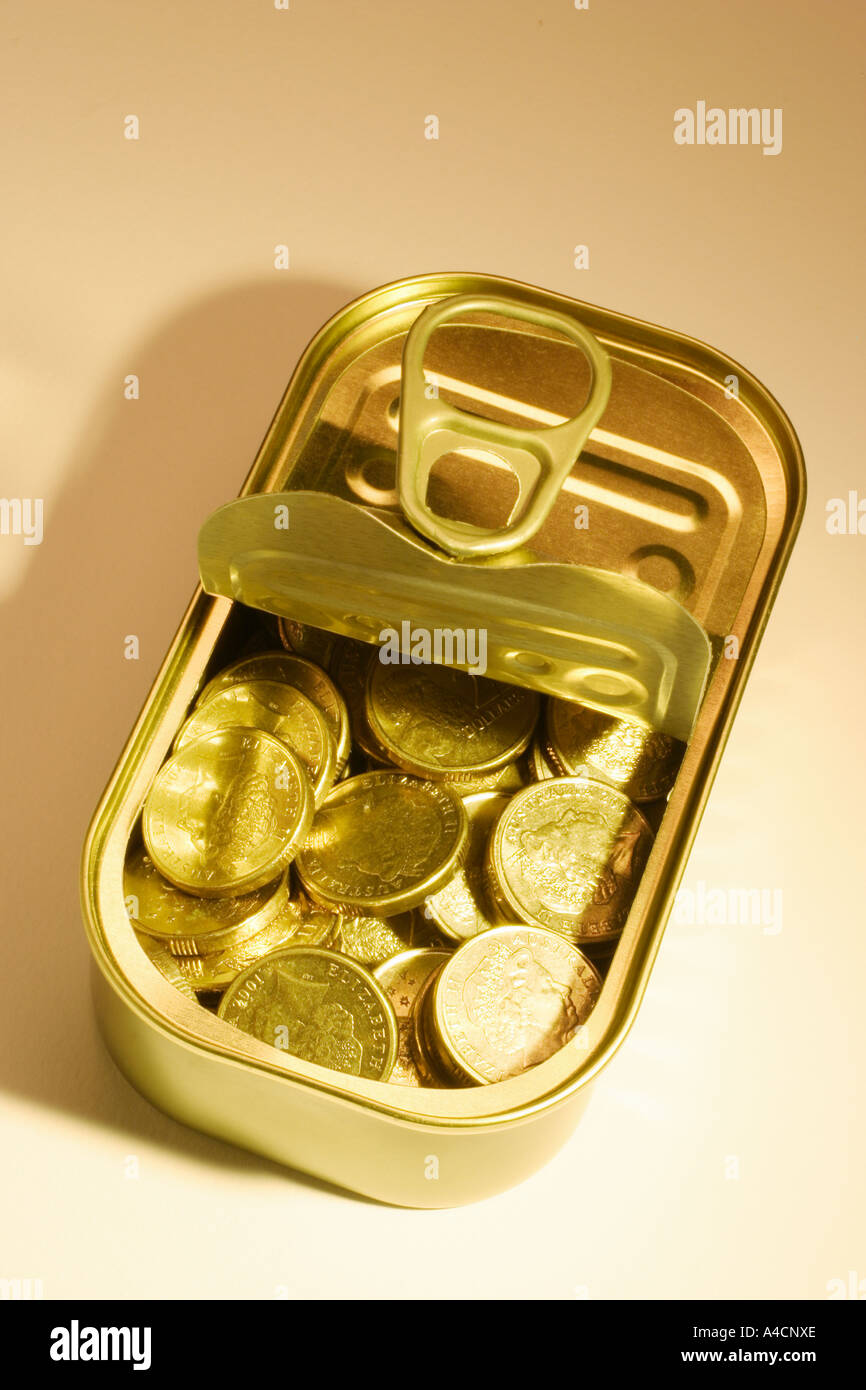 Coins in Tin Can Stock Photo - Alamy