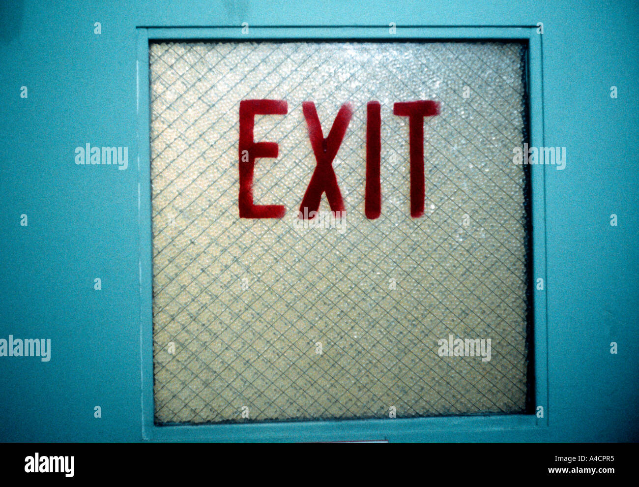 Exit sign on door Stock Photo - Alamy