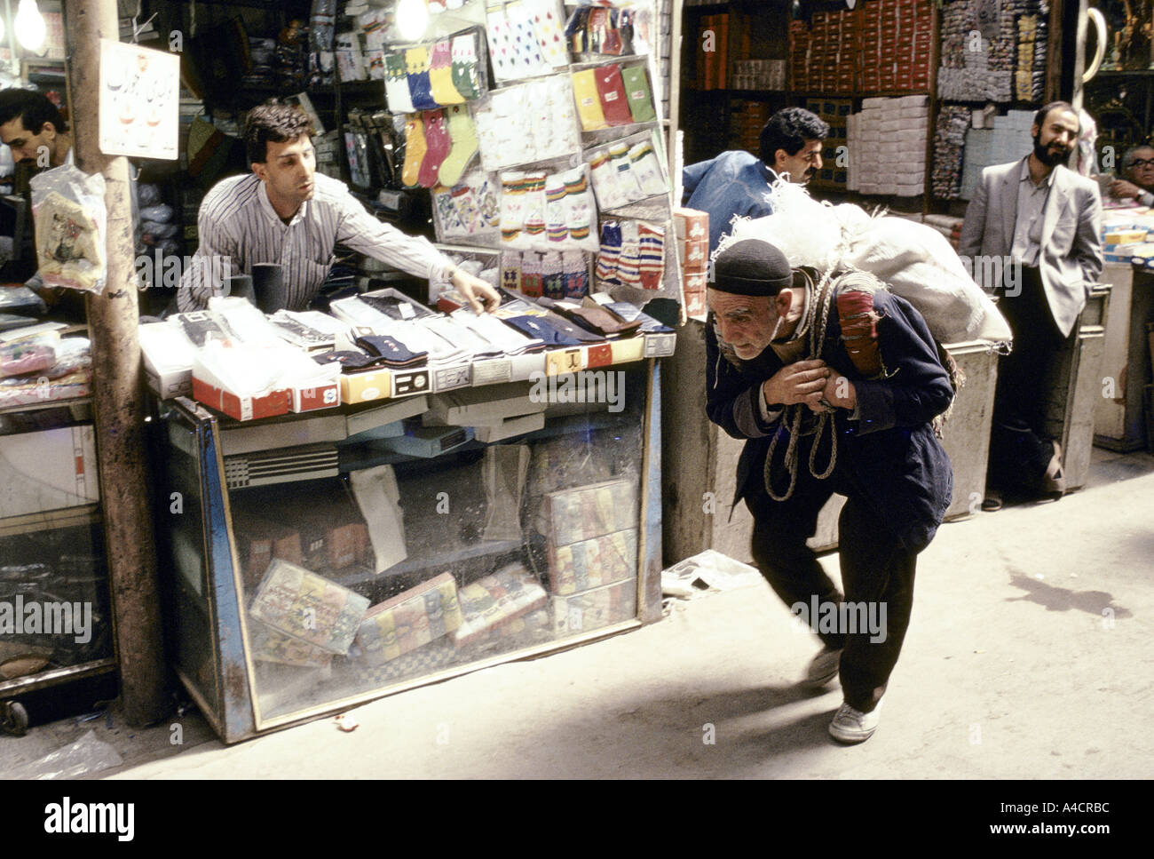 Man hunched over hi-res stock photography and images - Alamy