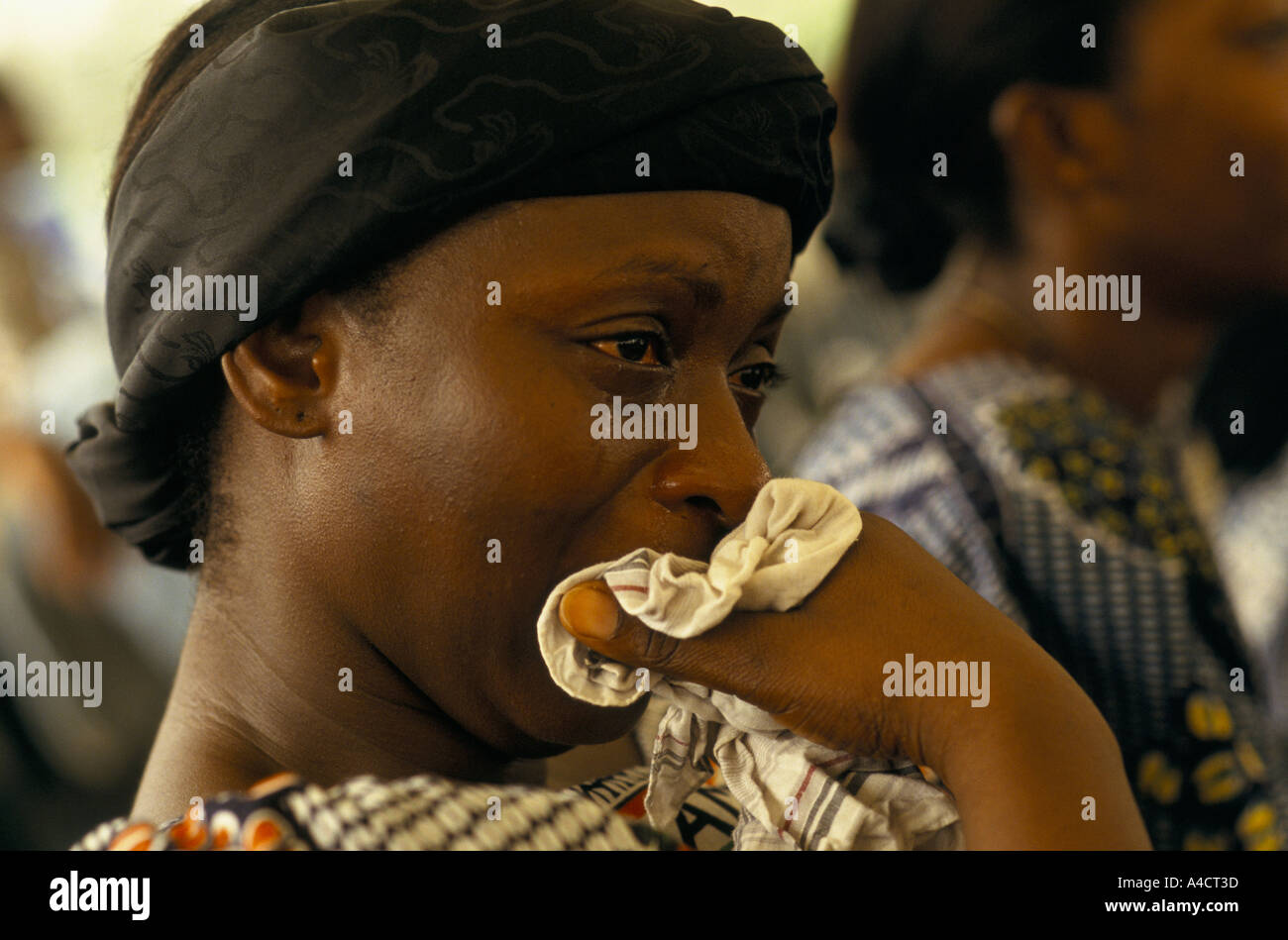 Mourner at funeral hi-res stock photography and images - Alamy