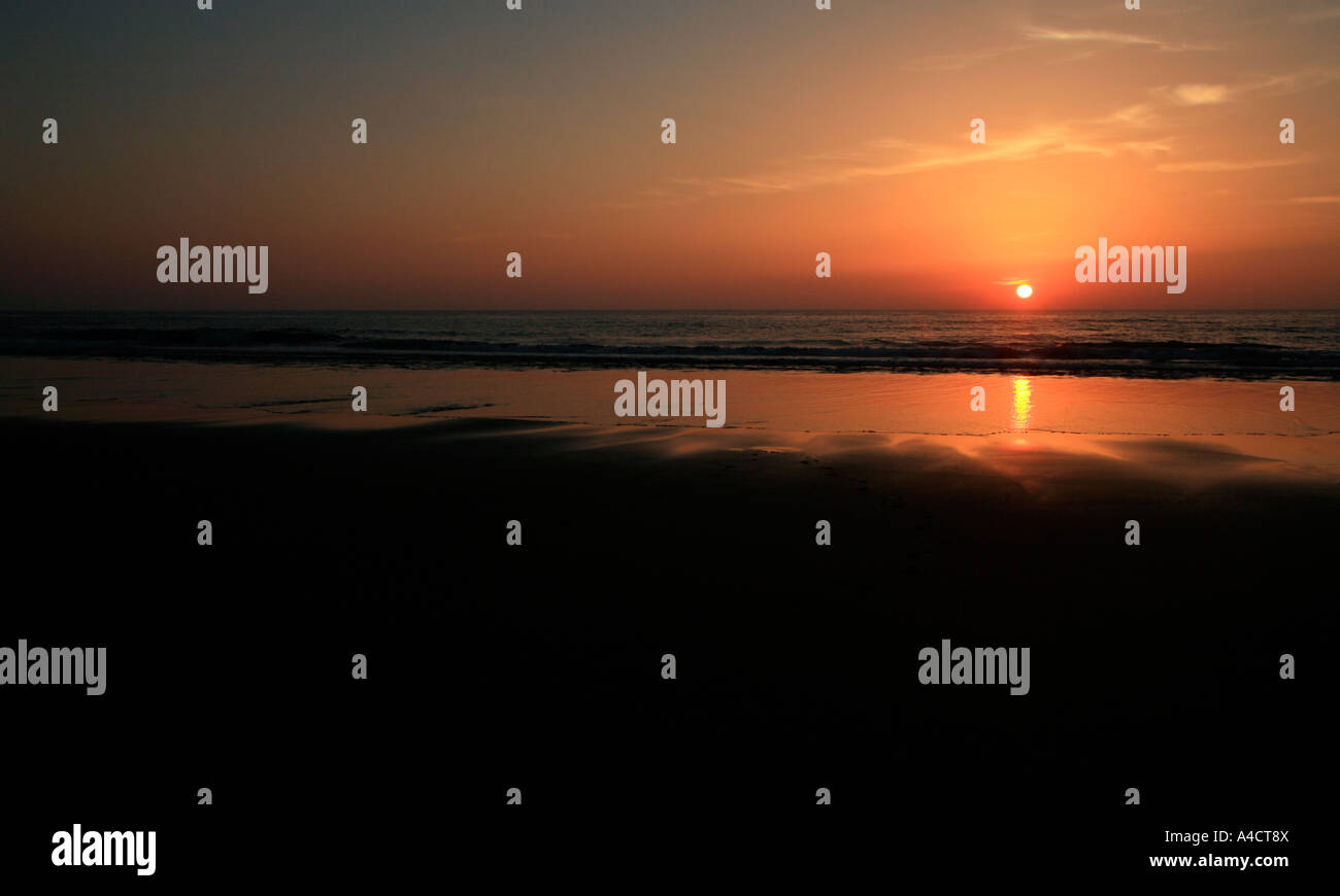 View of sunset over water Stock Photo - Alamy