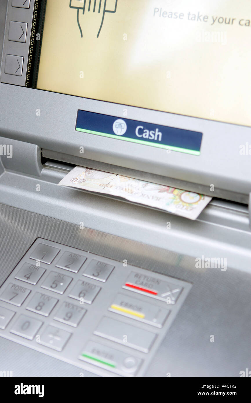 Person Using A Cash Machine Or Point Stock Photo - Alamy