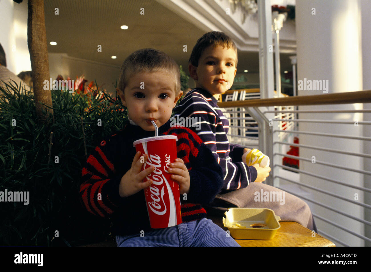 Boy drinking coke hi-res stock photography and images - Alamy