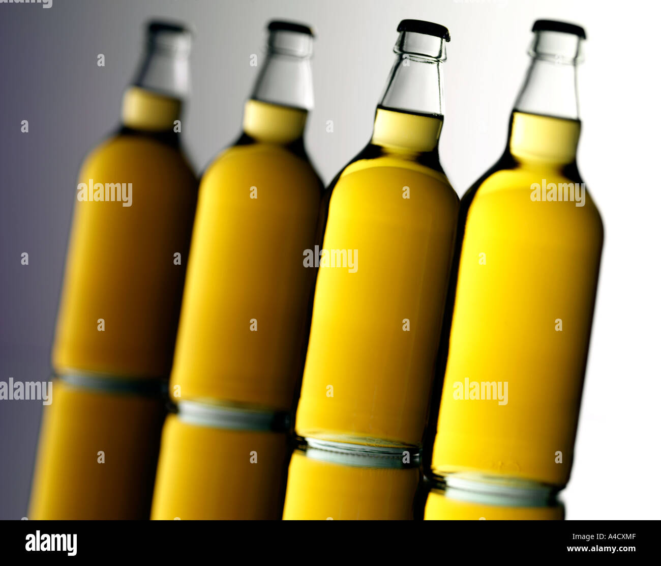 FOUR BOTTLES OF CIDER Stock Photo - Alamy
