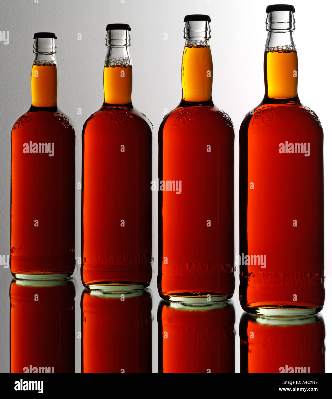 FOUR ALE BOTTLES Stock Photo - Alamy