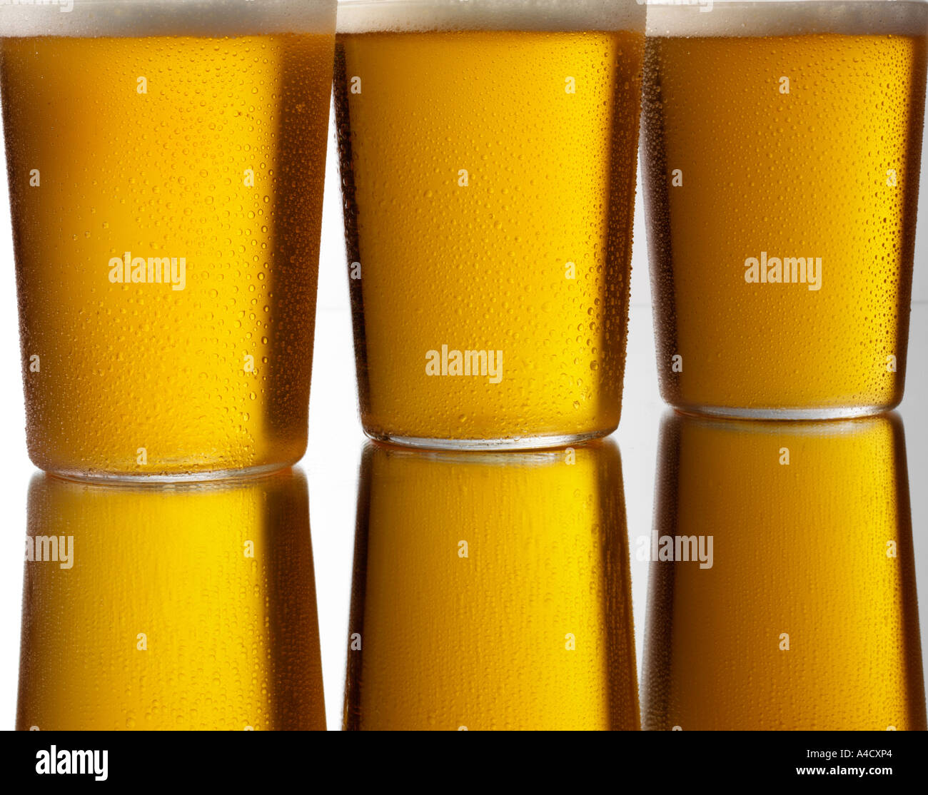 THREE PINTS OF LAGER Stock Photo - Alamy