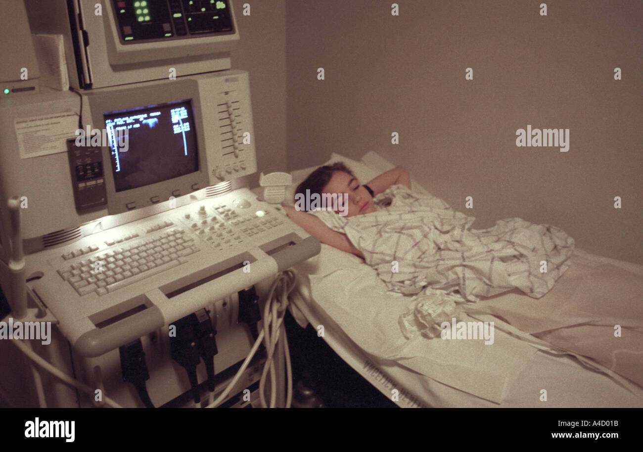 Female child having machine medical test Stock Photo - Alamy
