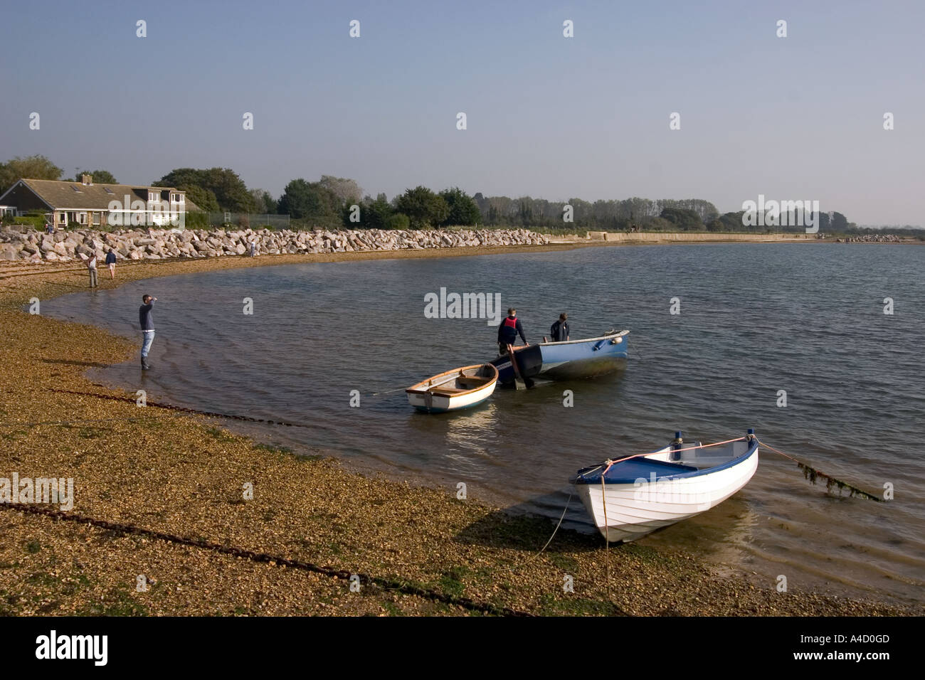 Shore activity at Prinsted Nr Chichester West Sussex England Stock Photo - Alamy